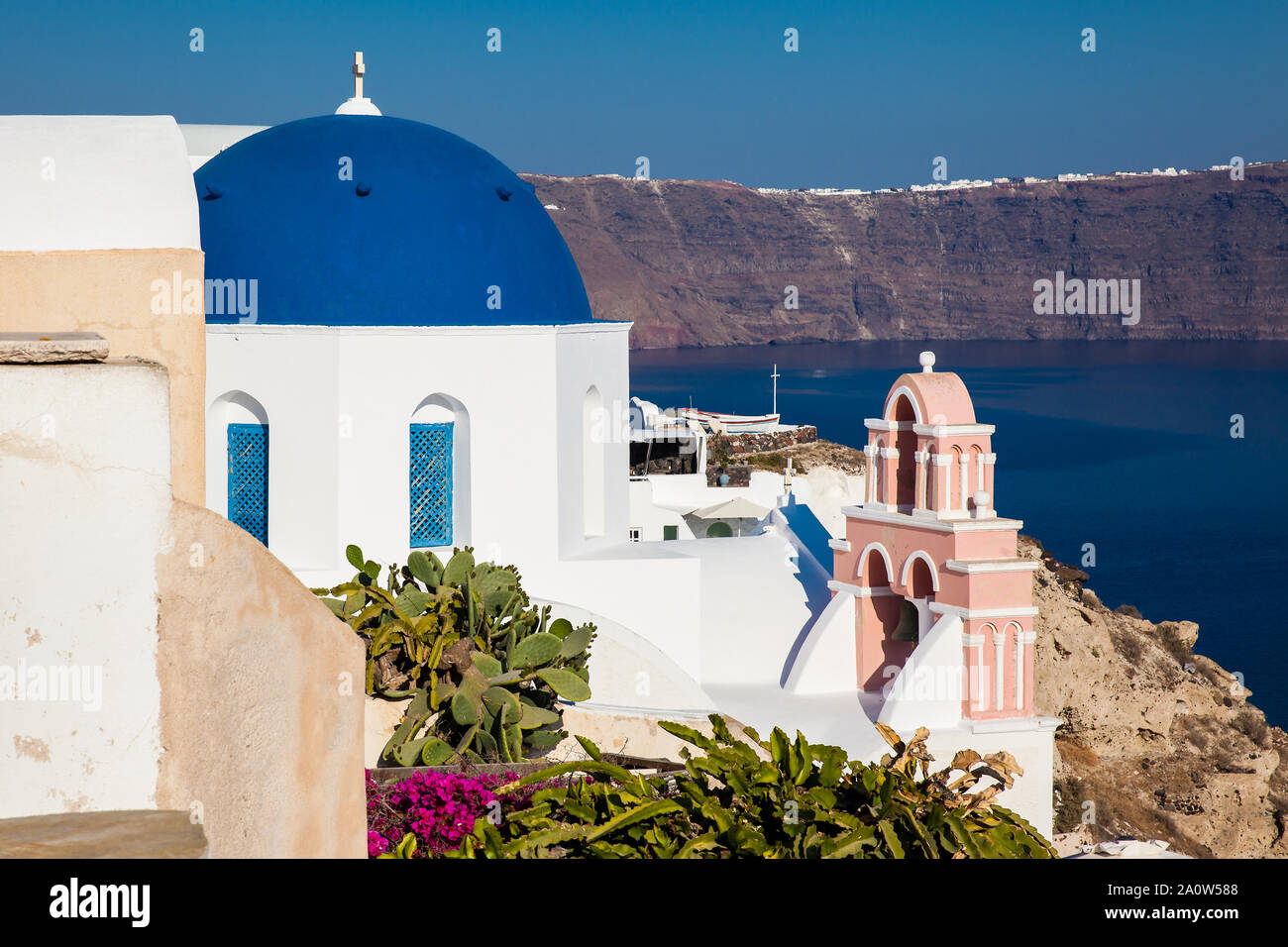 Traditional architecture of the churches of the Oia City in Santorini ...