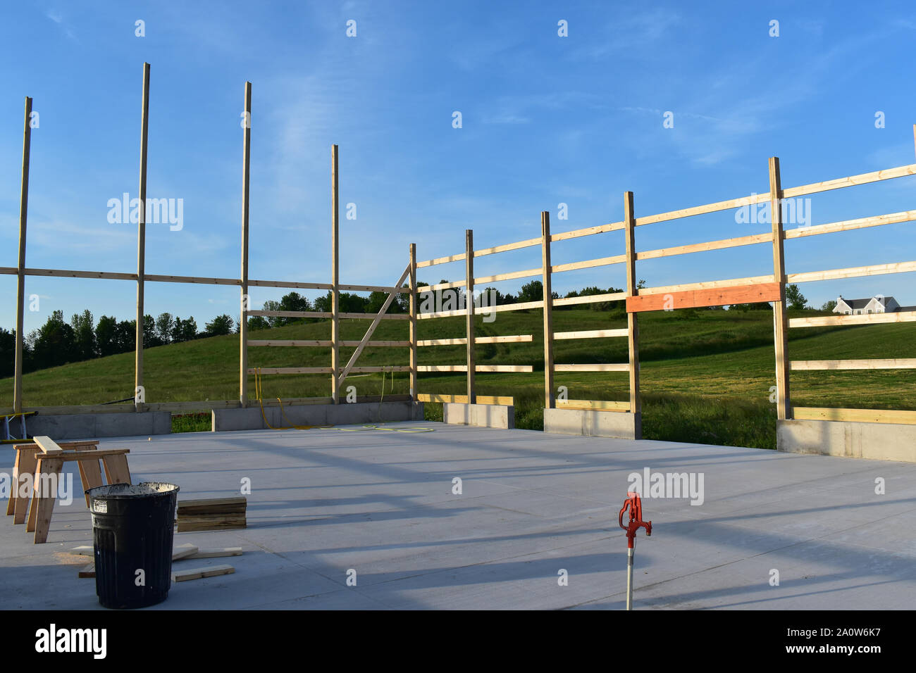 Barn under construction framed and partially complete on a farm in a ...
