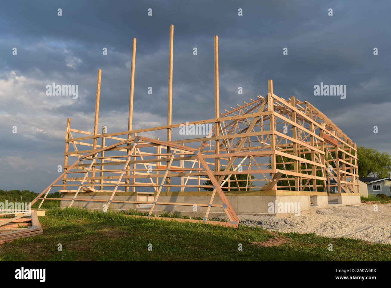 Barn under construction framed and partially complete on a farm in a ...