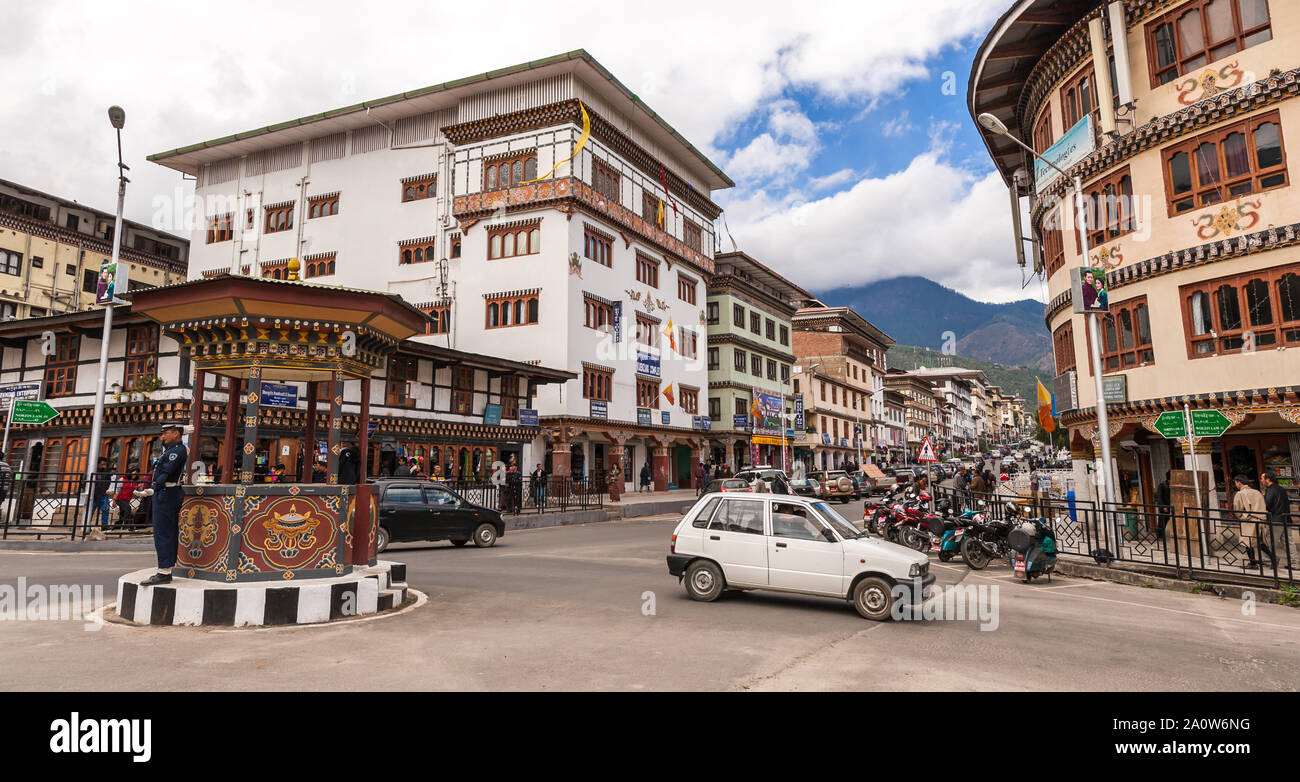 Thimphu, Bhutan, 01 Nov 2011: Main street in capital city with human ...