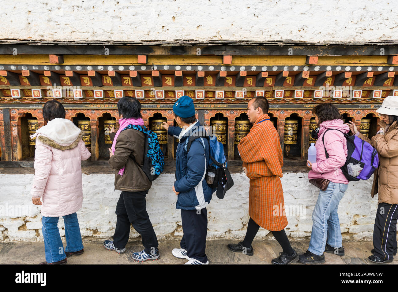Thimphu, Bhutan, 02 Nov 2011: Tourists turning prayer wheels at ...