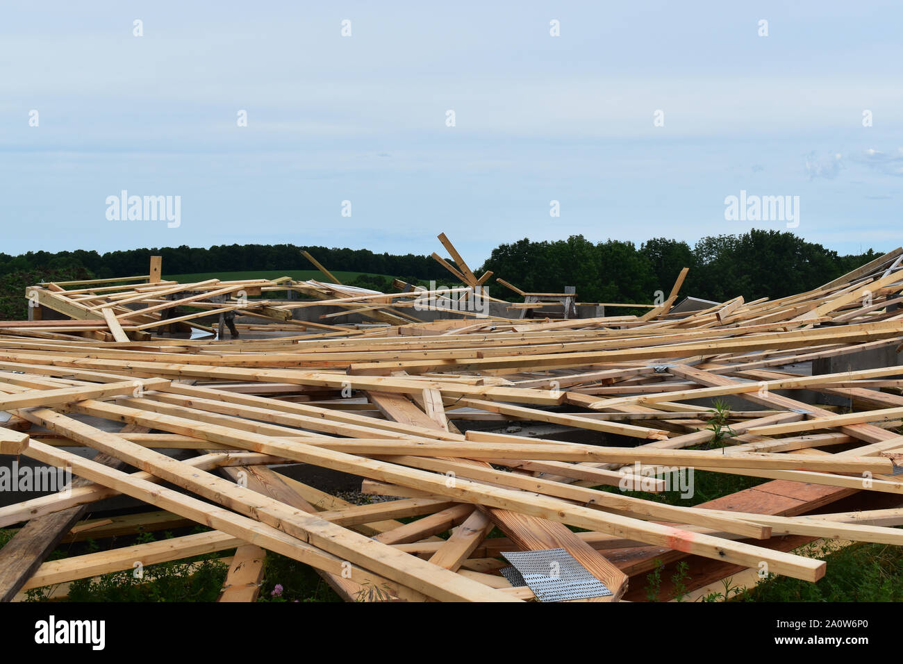 Collapsed barn building after storm in a pile of lumber Stock Photo - Alamy