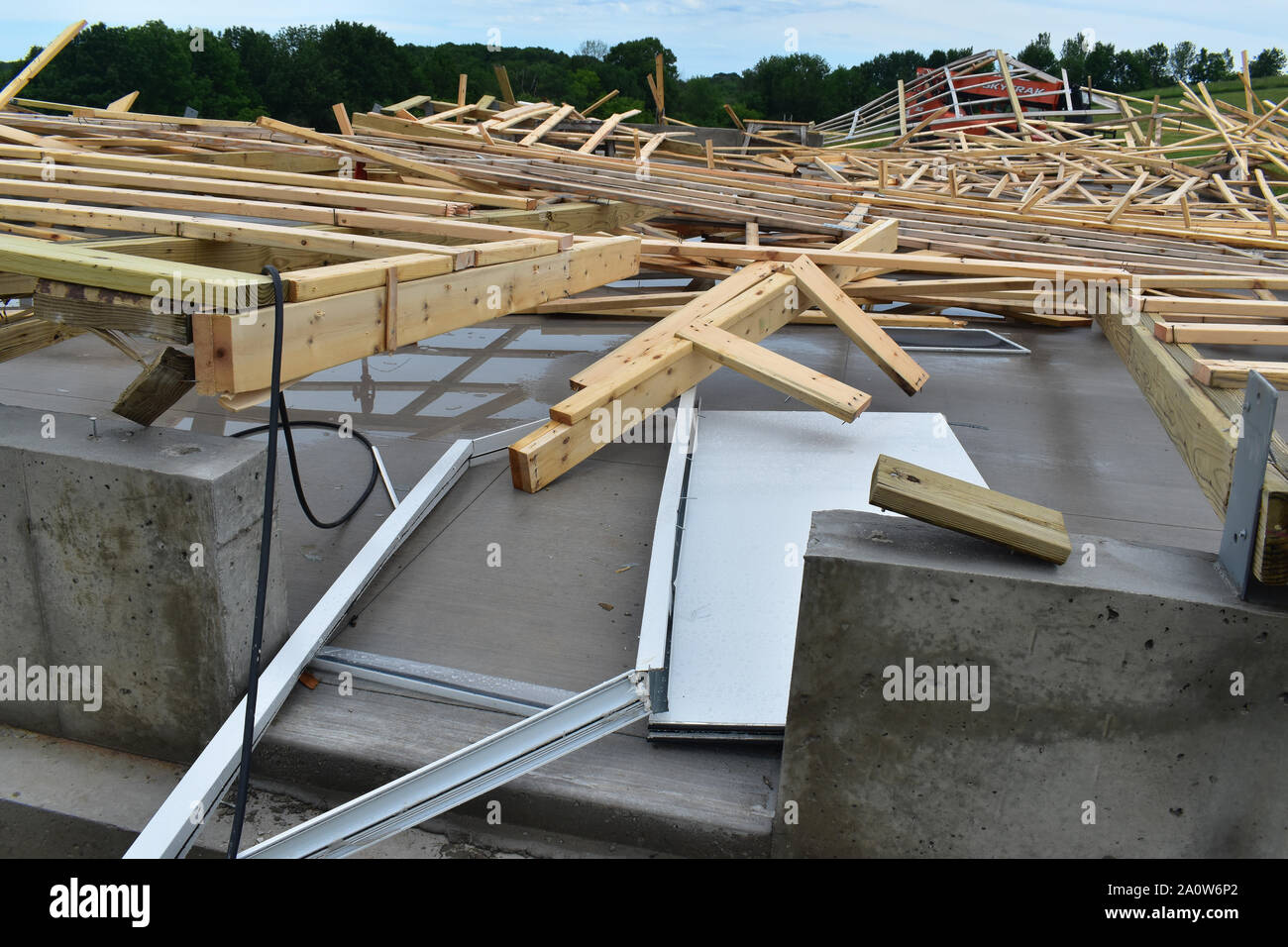 Collapsed barn building after storm in a pile of lumber Stock Photo - Alamy