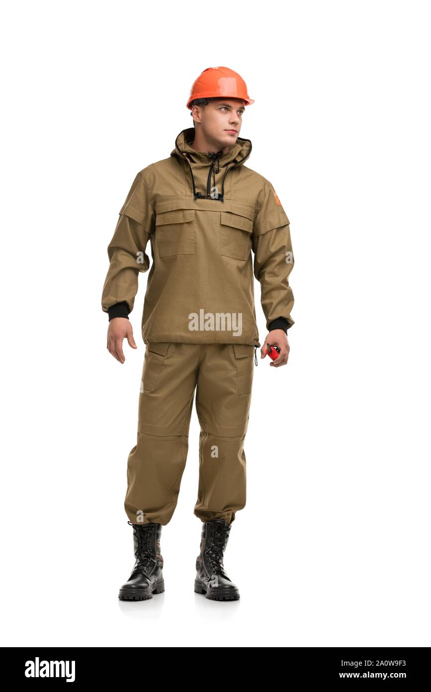 Man in work clothes and helmet view Stock Photo - Alamy