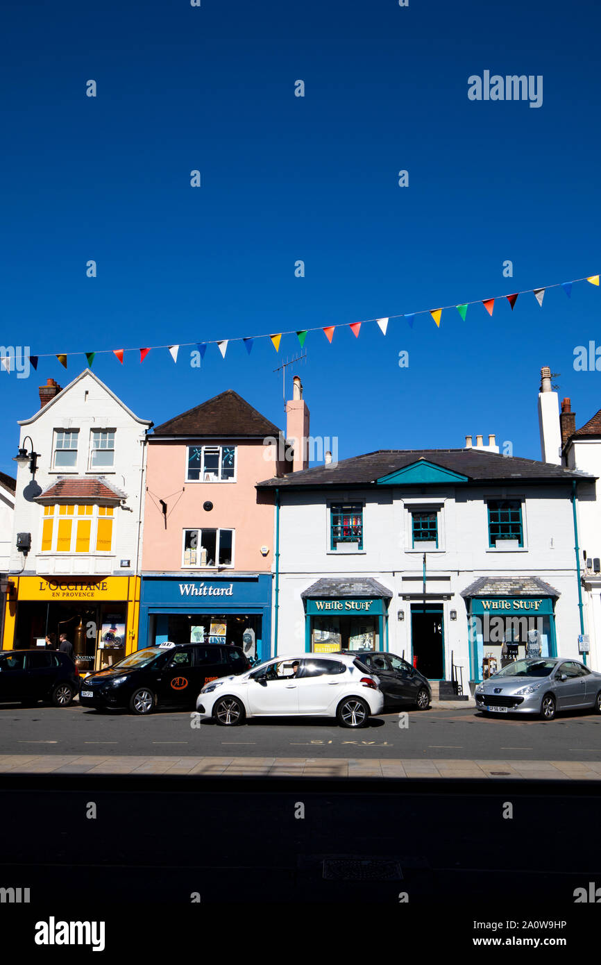 row of retail shops in city centre Stock Photo - Alamy