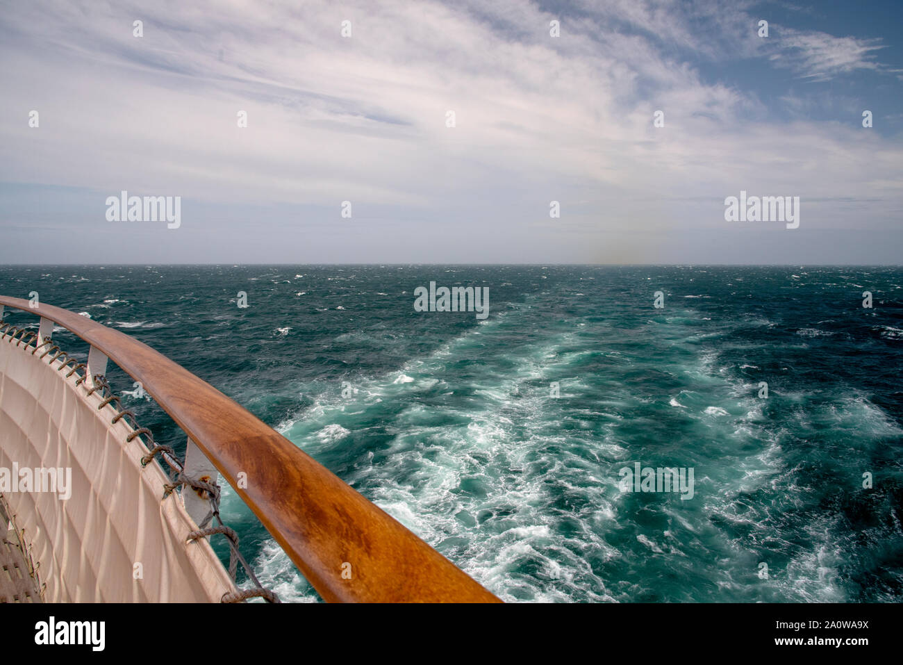 Looking over the stern of the queen Mary 2 at the black water of the ...