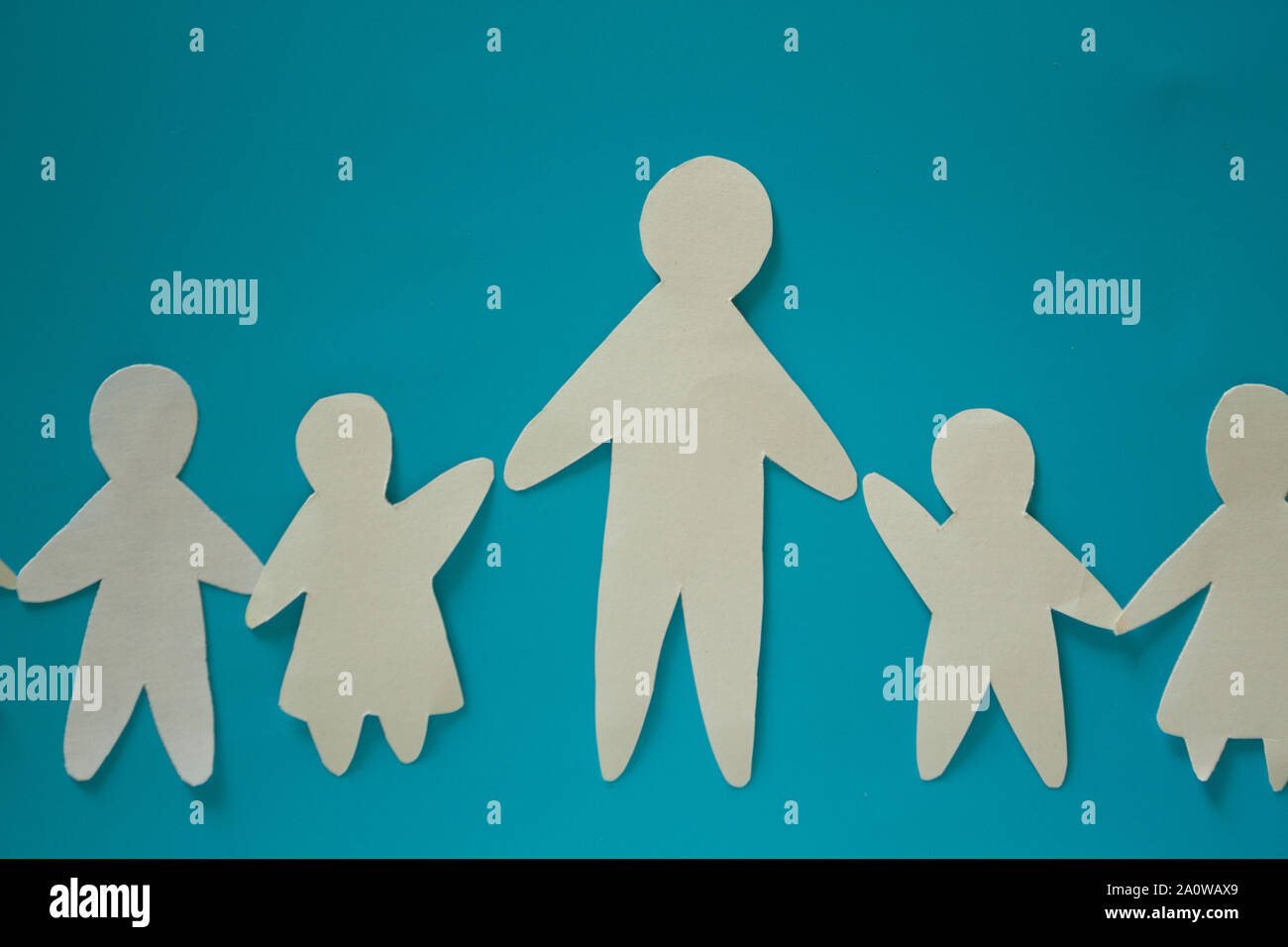 Father of many children concept. Paper cut Stock Photo - Alamy