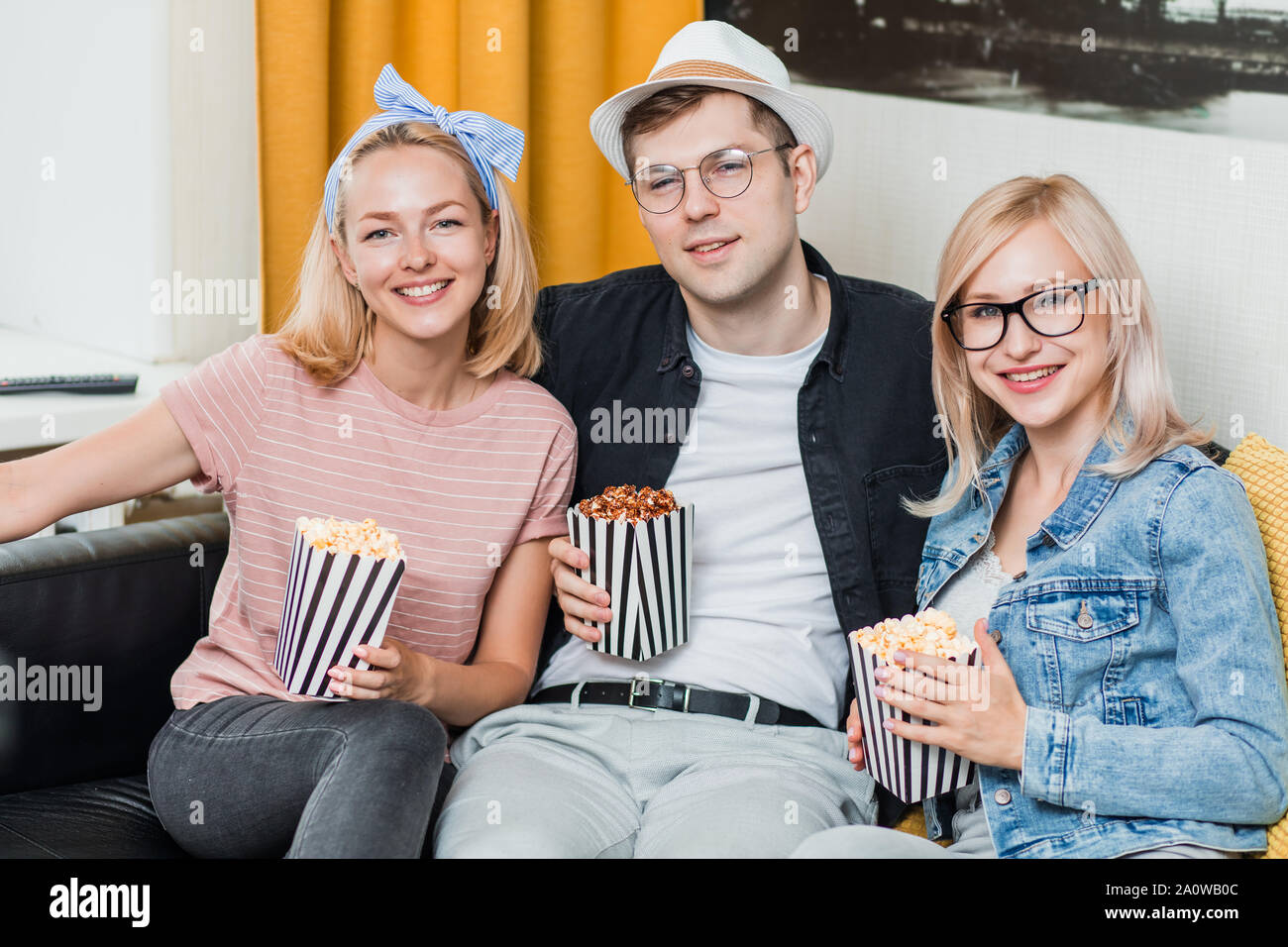 Happy cheerful caucasian students wearing casual clothes relaxing at ...