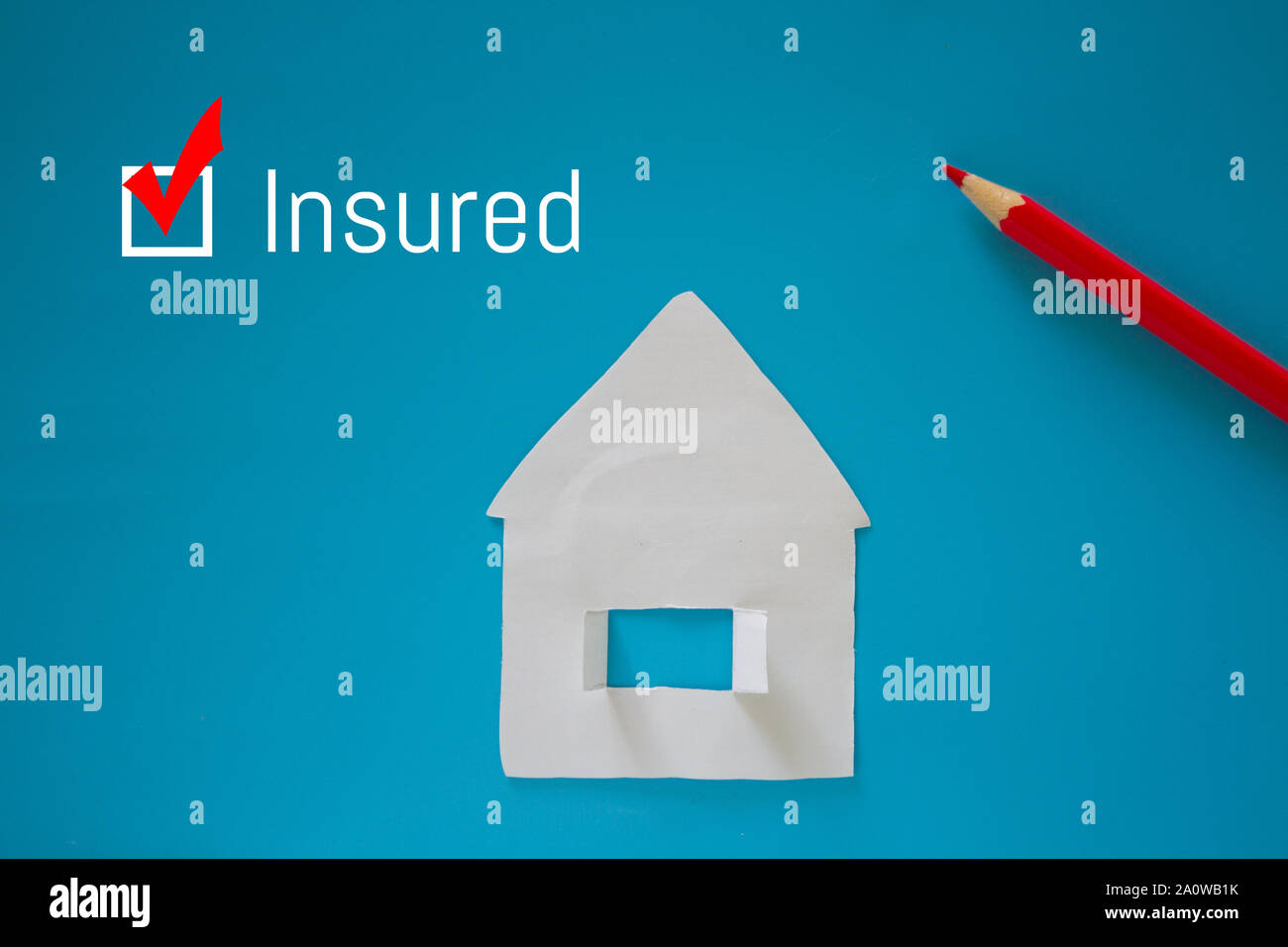 House insurance concept image on blue background Stock Photo - Alamy