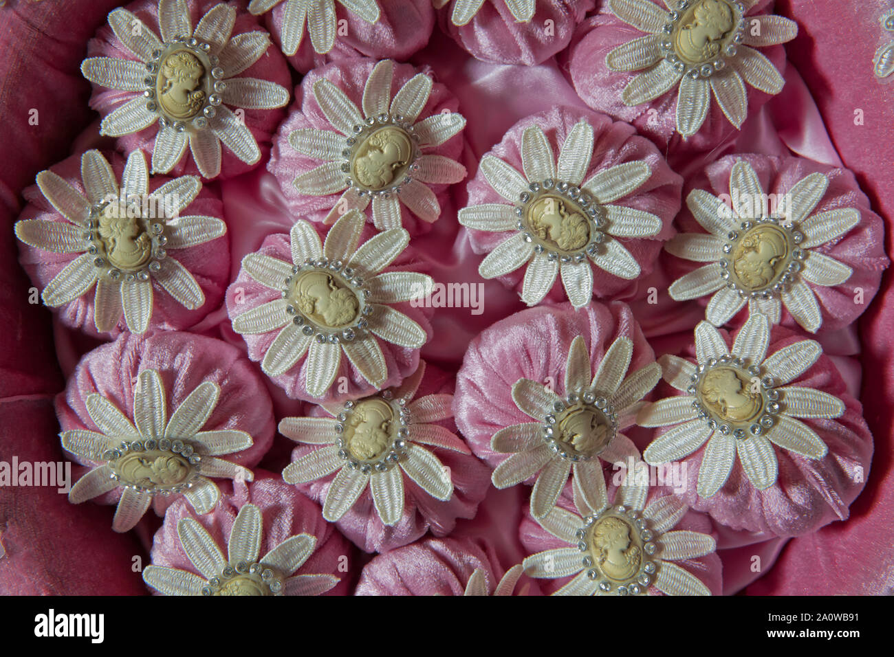 Pink flowers candy in the bag . Pink background Stock Photo - Alamy