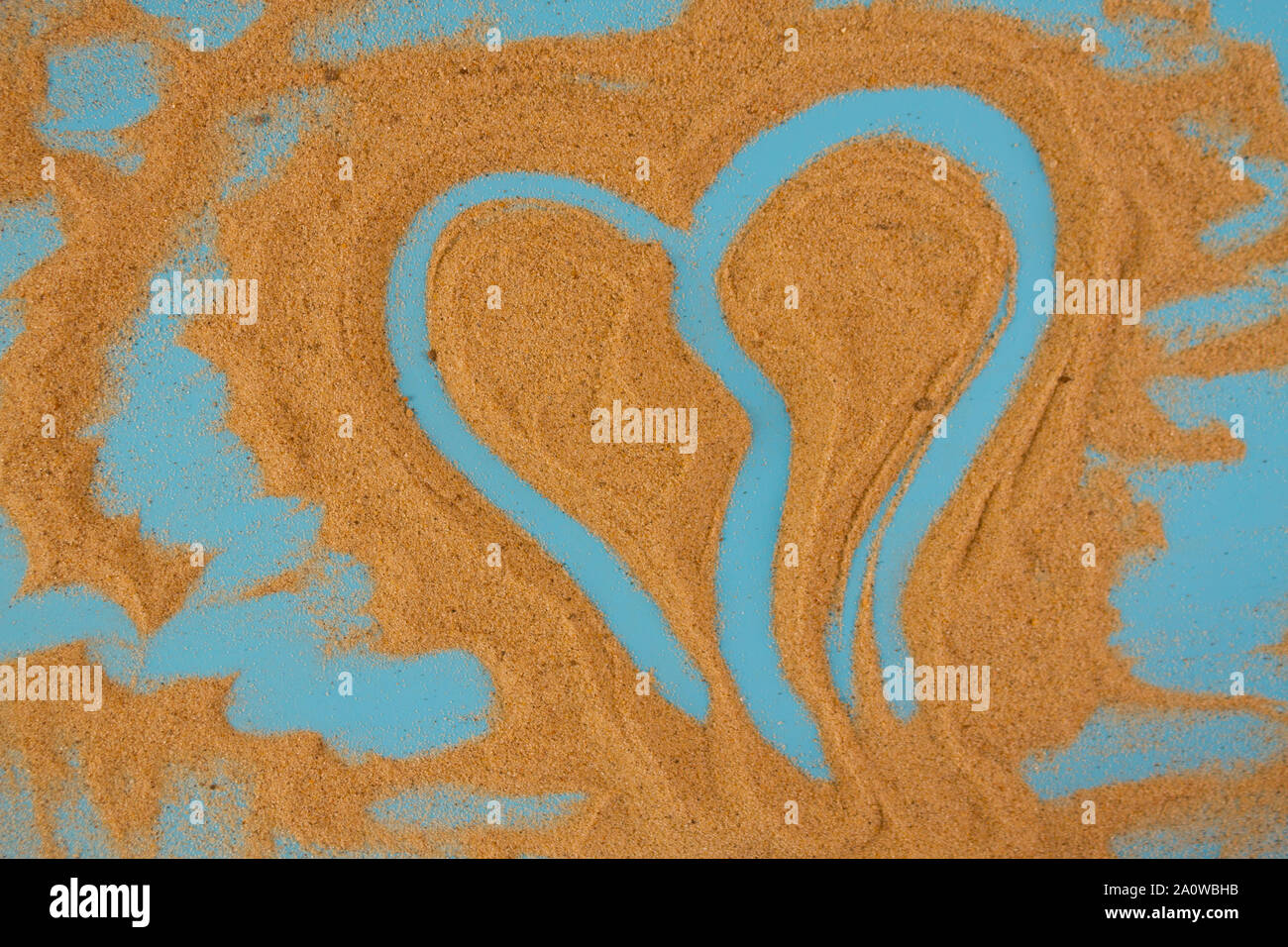 Broken heart concept. Heart made of sand Stock Photo - Alamy