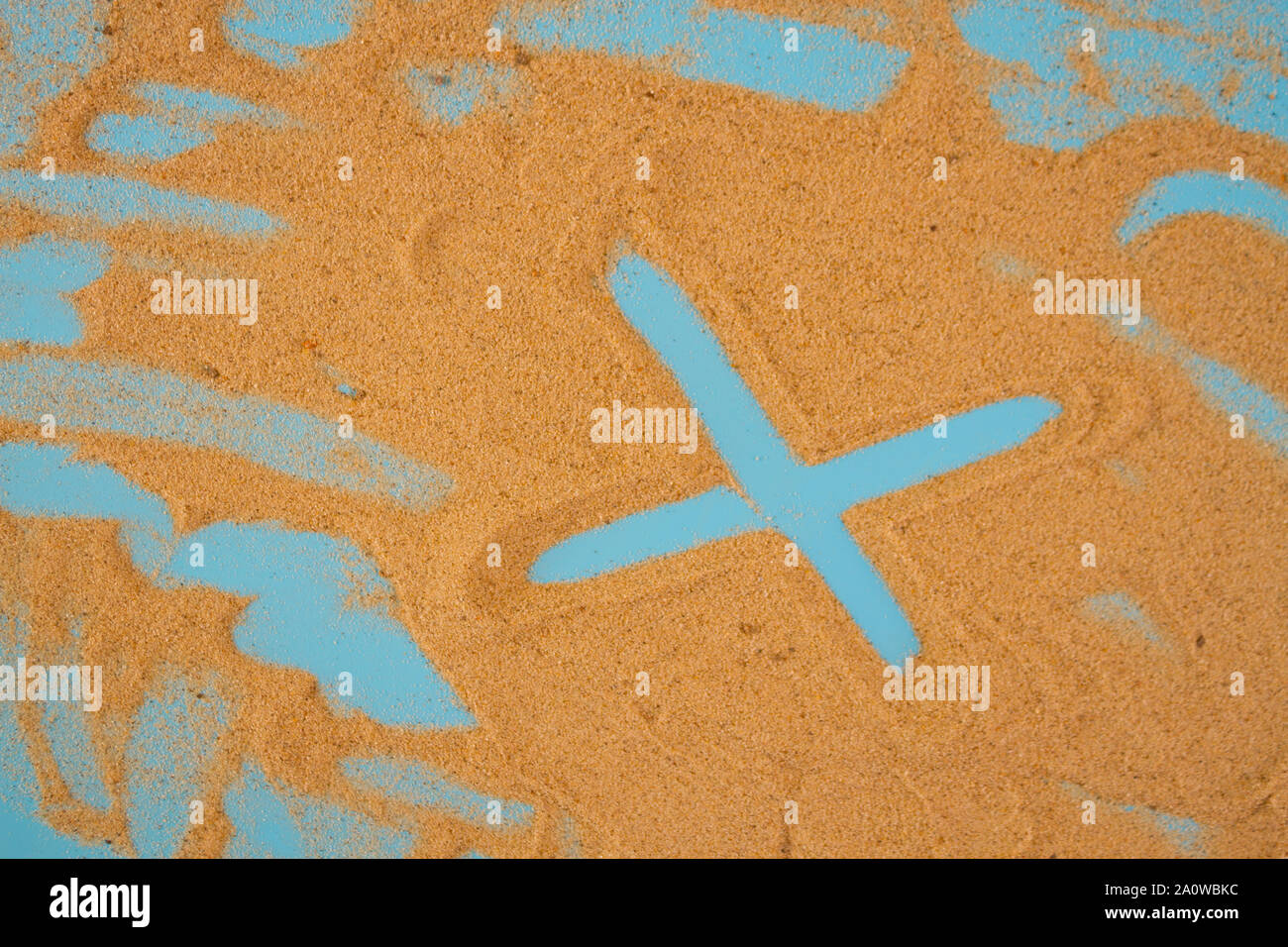 Pirate cross on sand. Treasure chest concept Stock Photo - Alamy