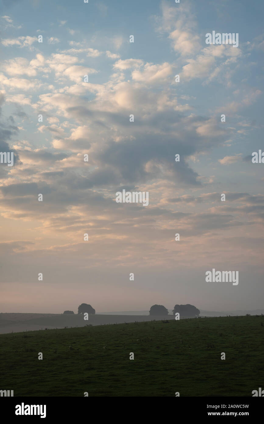 Beautiful Summer sunrise landscape image over English countryside with ...