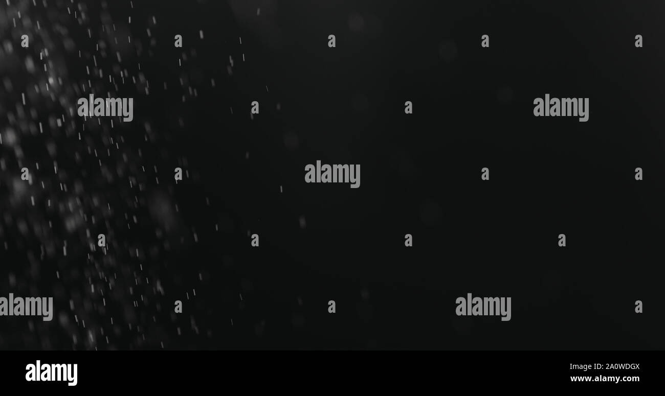 fine dust particles falling on black background, wide photo Stock Photo ...