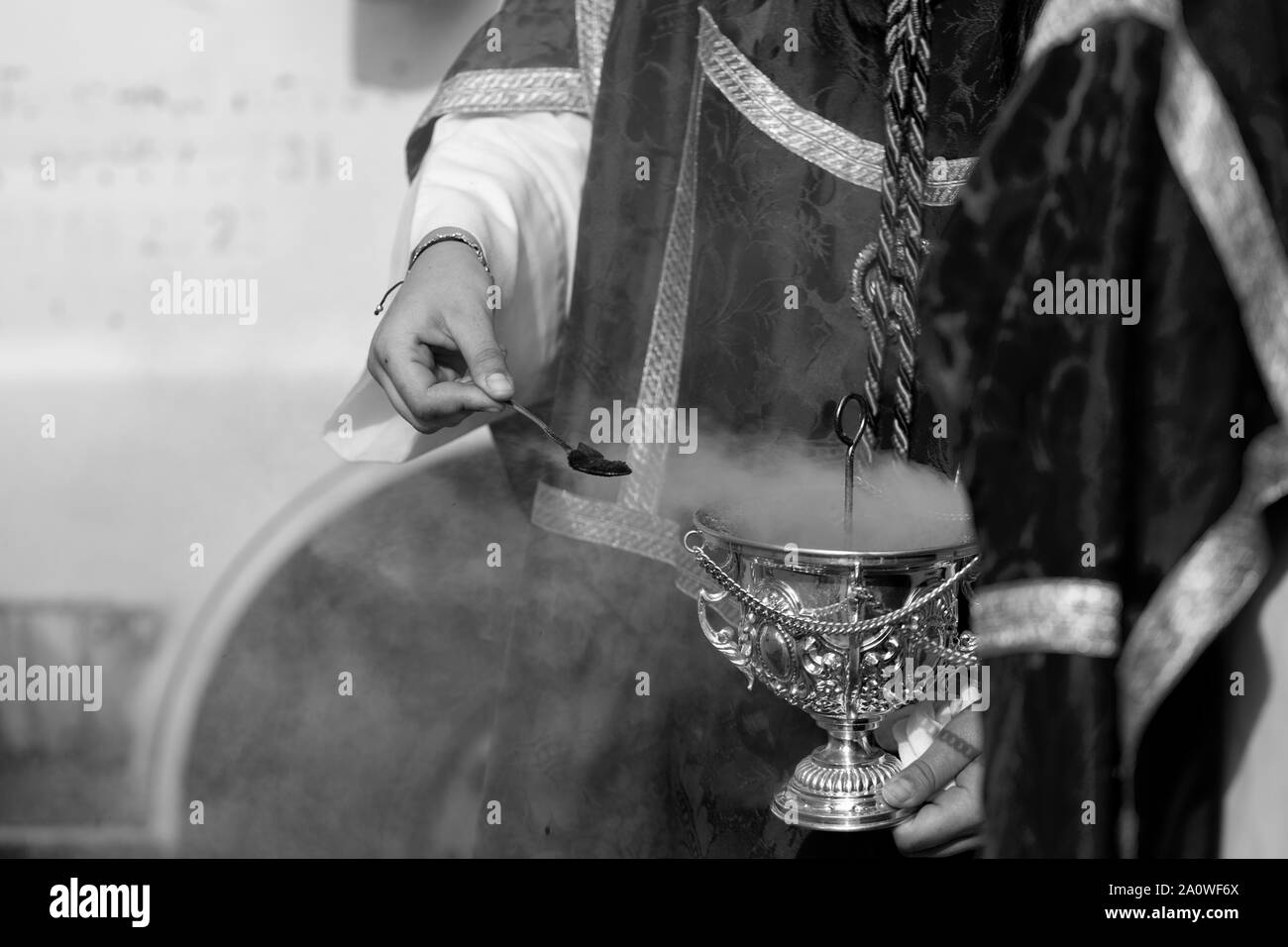 Child holding a censer in a procession, Holy Week Stock Photo - Alamy