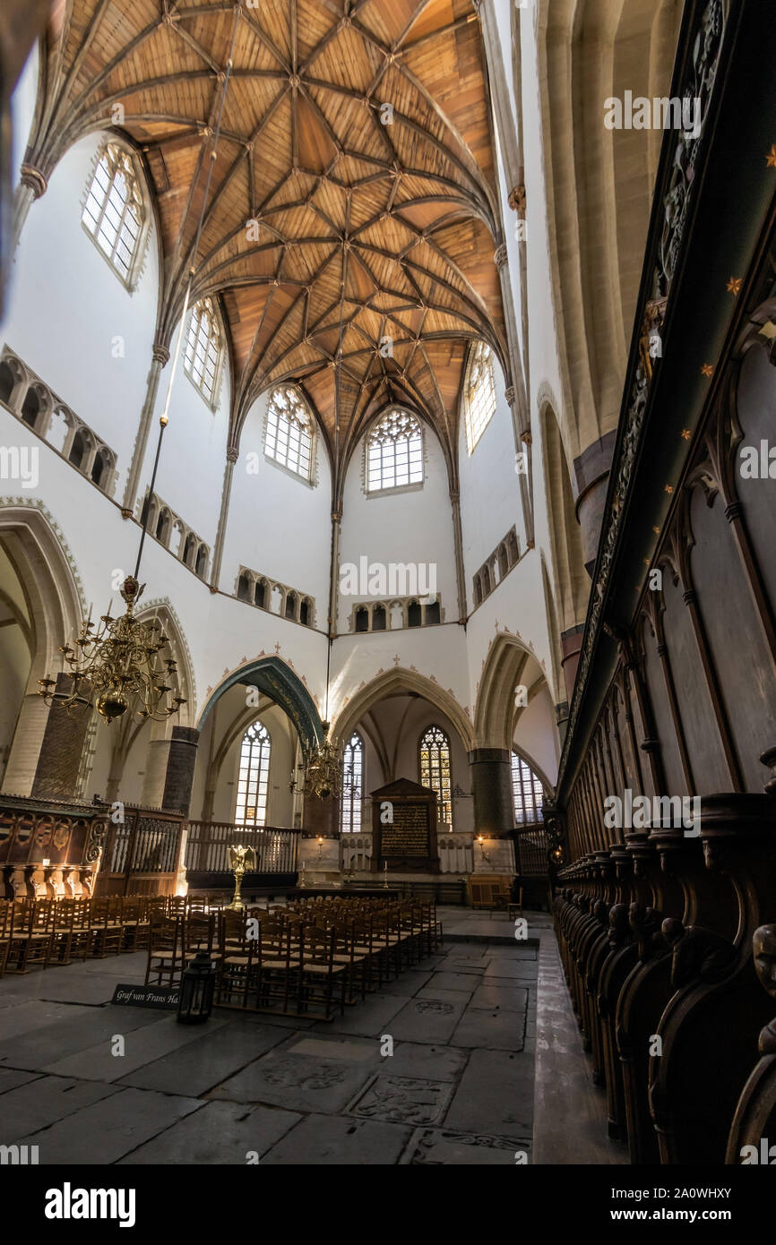 The interior and main altar of the St. Bavo Church, Haarlem Stock Photo ...