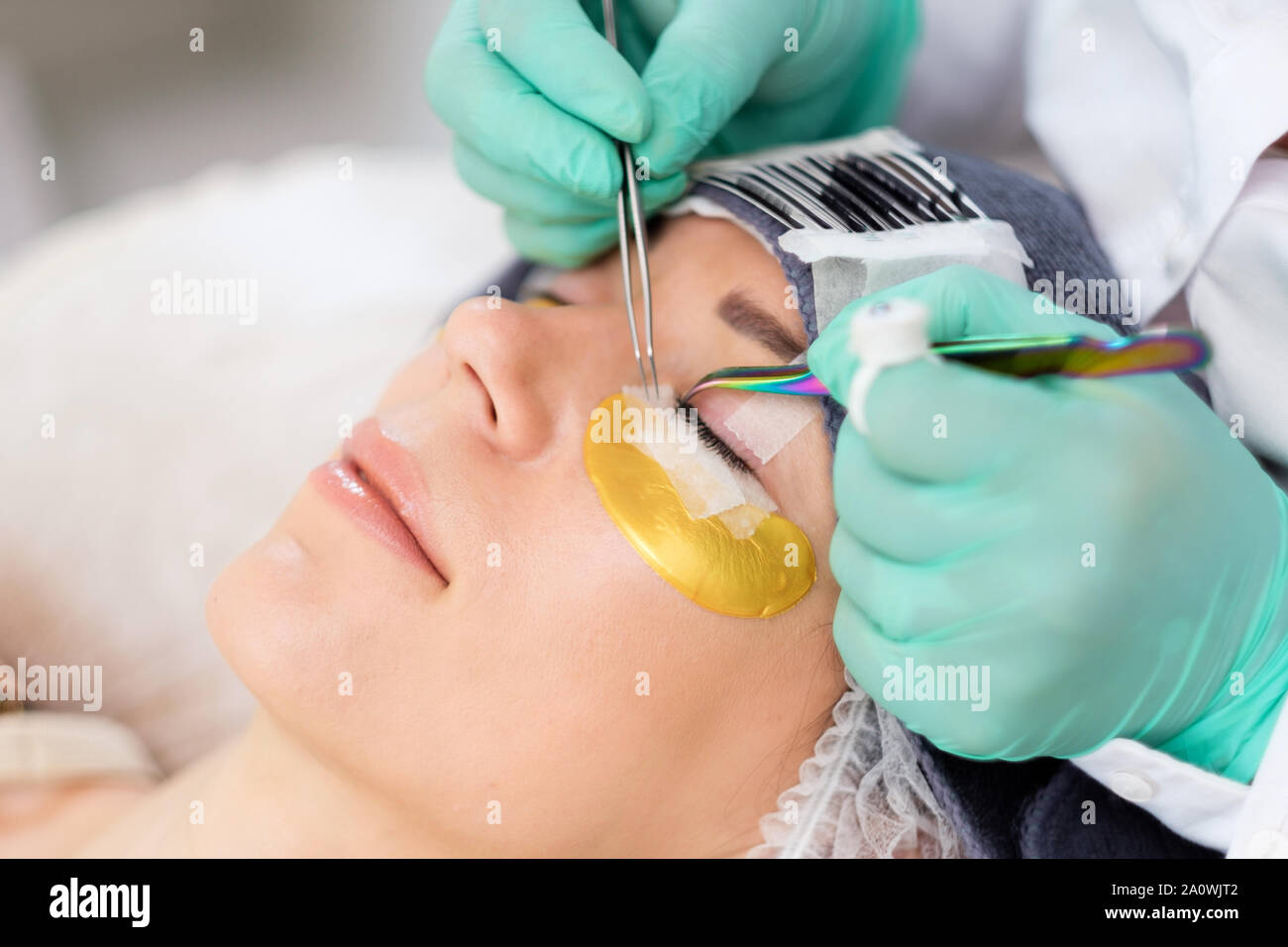 Eyelash extension procedure working process hi-res stock photography ...