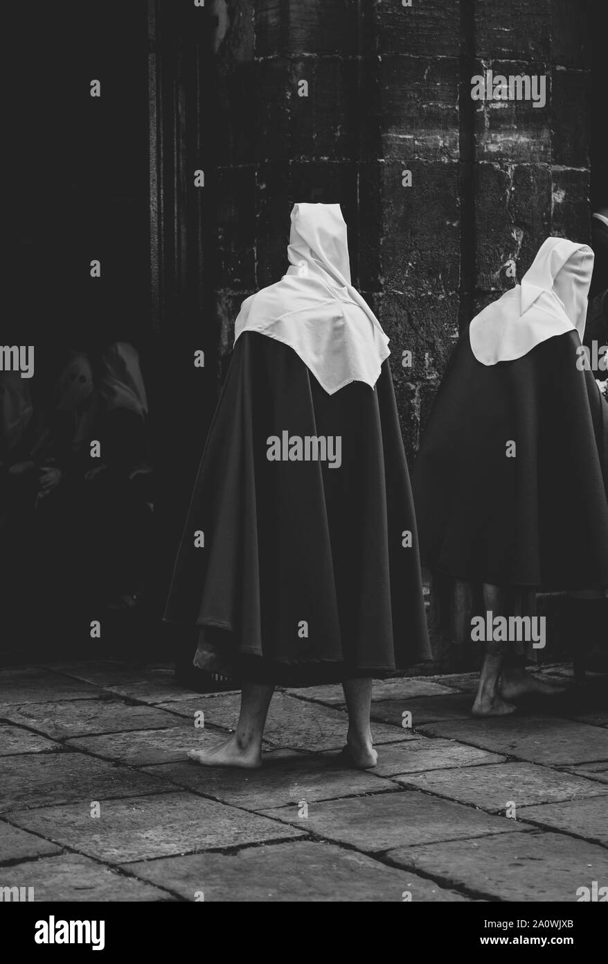 Hooded people. Procession. Holy Week Stock Photo - Alamy