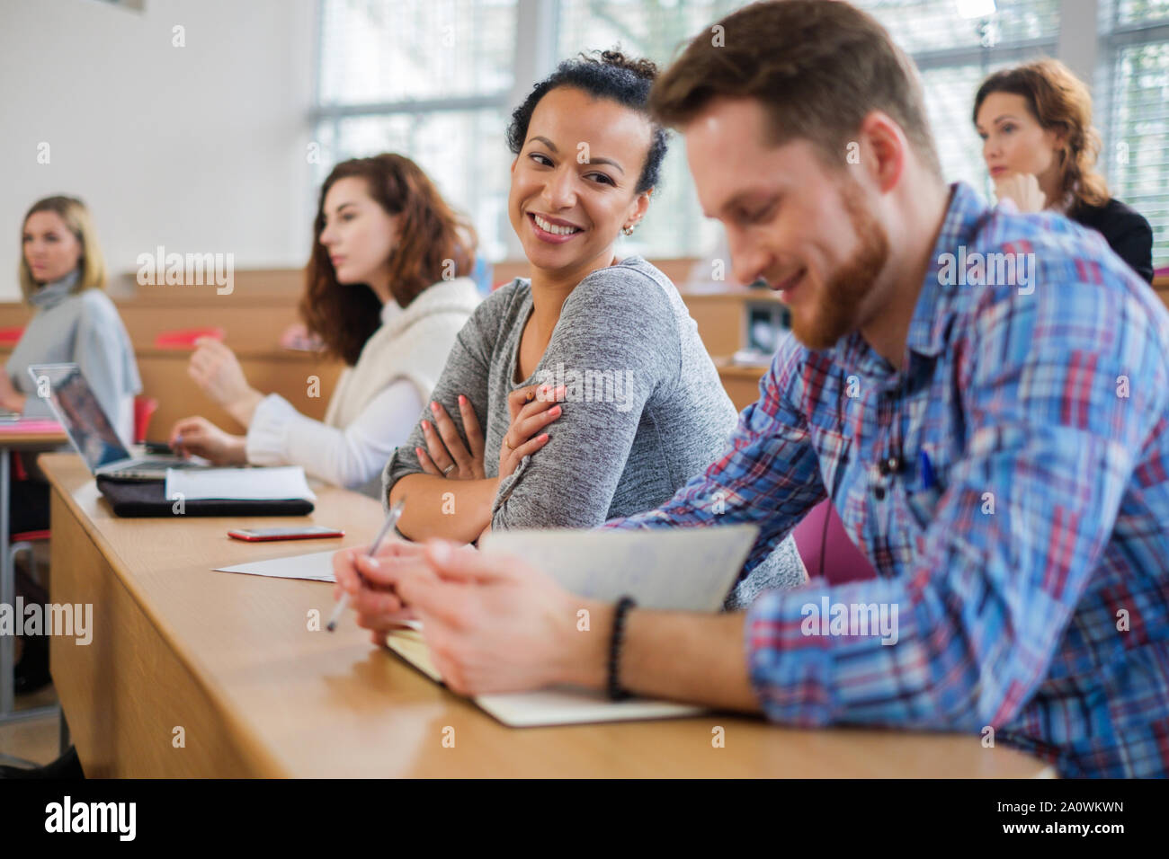 Multicultural group of students in an auditorium Stock Photo - Alamy