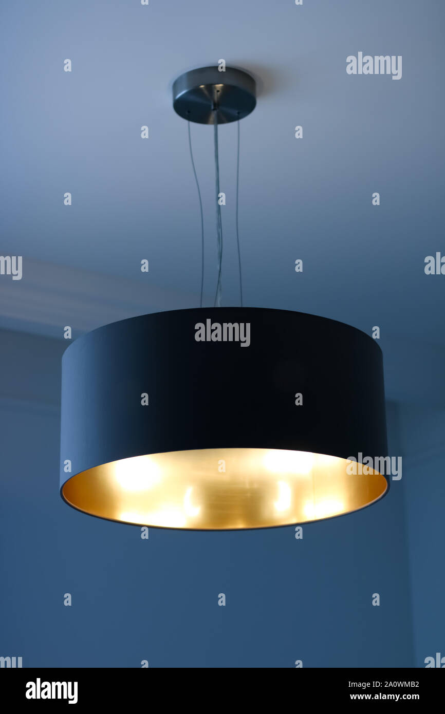 Interior design, indoor lamps and electricity concept - Golden lamp in ...