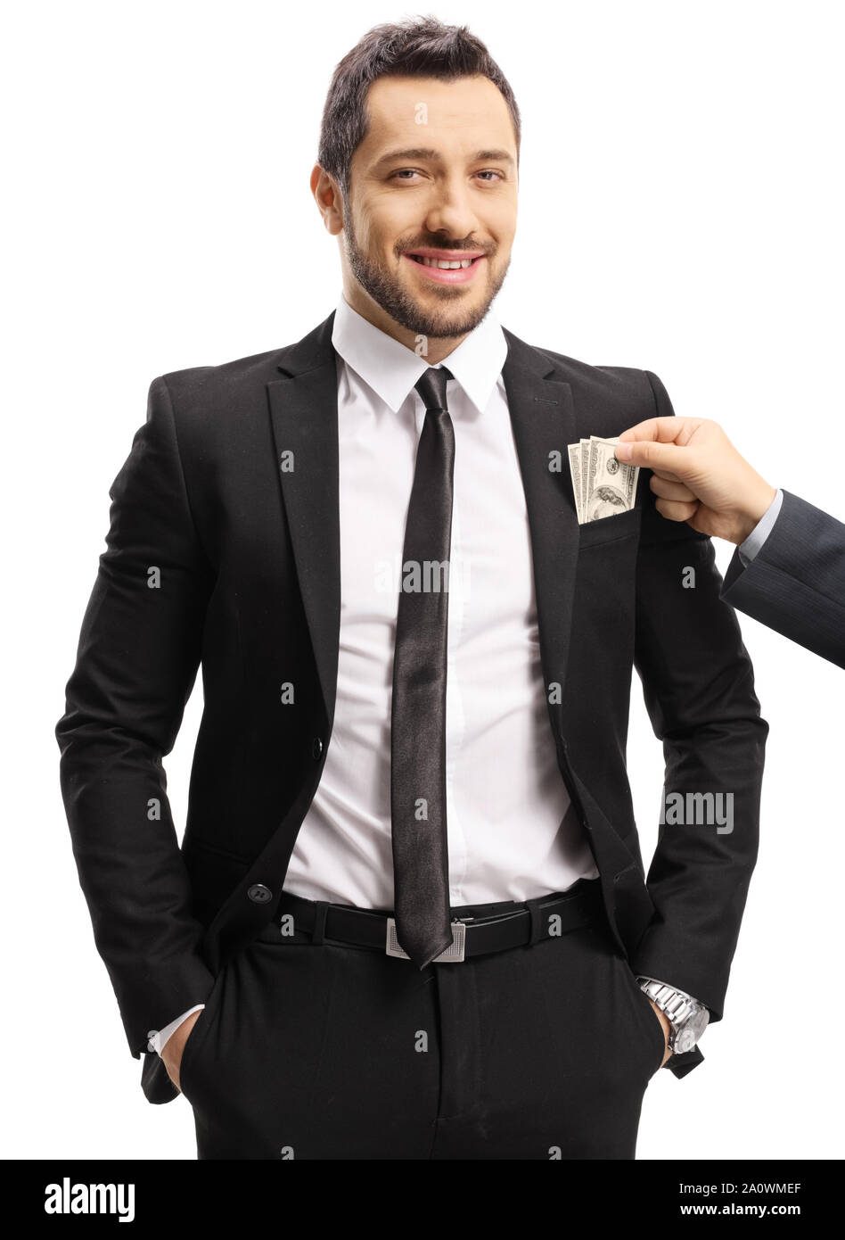 Young businessman getting bribe and smiling isolated on white ...