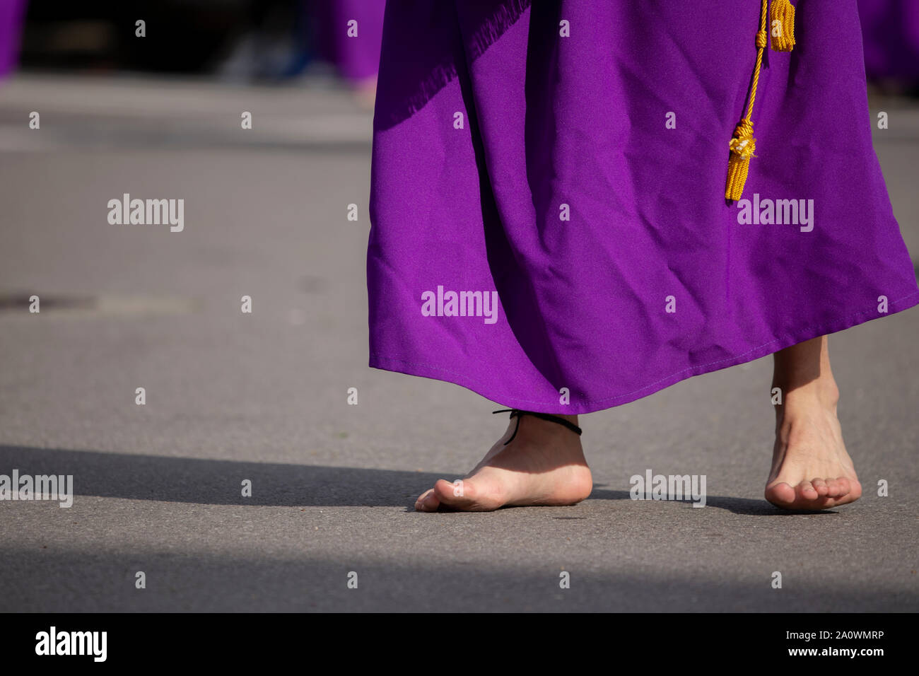 Barefoot man in a procession, Holy Week Stock Photo - Alamy