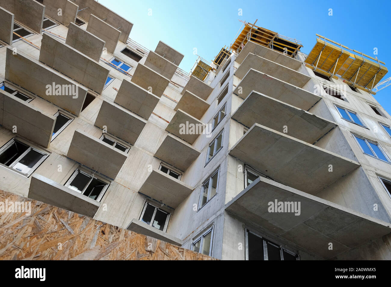 View of high rise building construction with unfinished balconies Stock ...