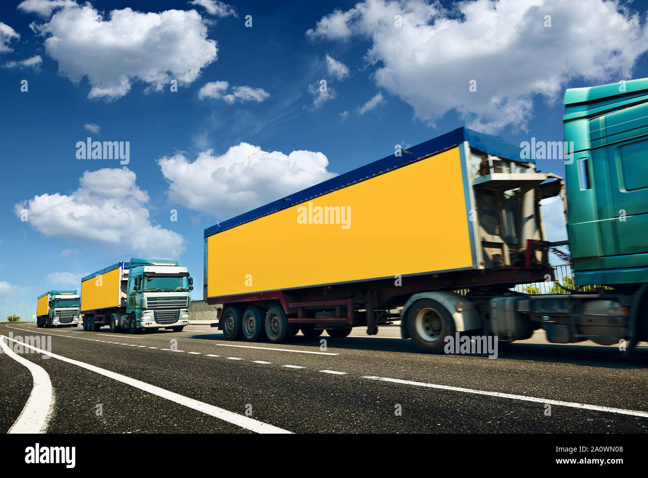 Yellow trucks is on highway - business, commercial, cargo ...