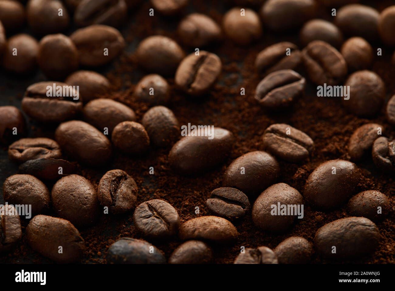 Roasted coffee grains mixed with ground coffee Stock Photo - Alamy