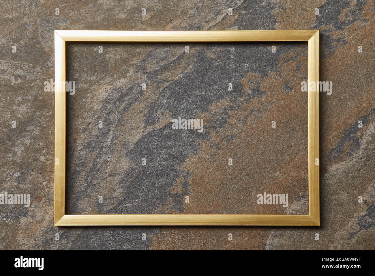 empty golden frame on stone background with copy space Stock Photo - Alamy
