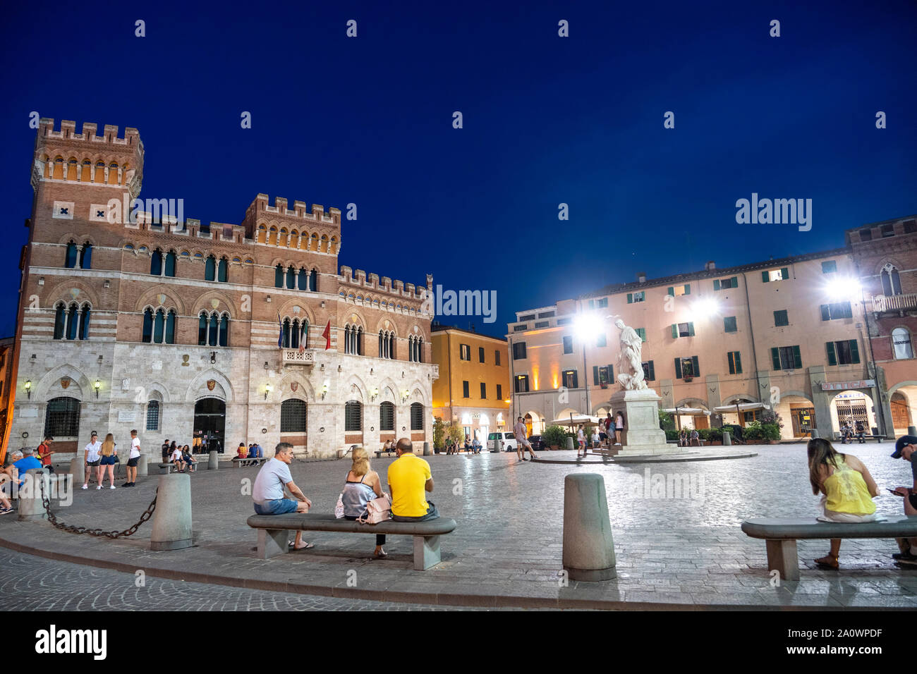 Grosseto, Tuscany, Italy: the cathedral square by night with people ...