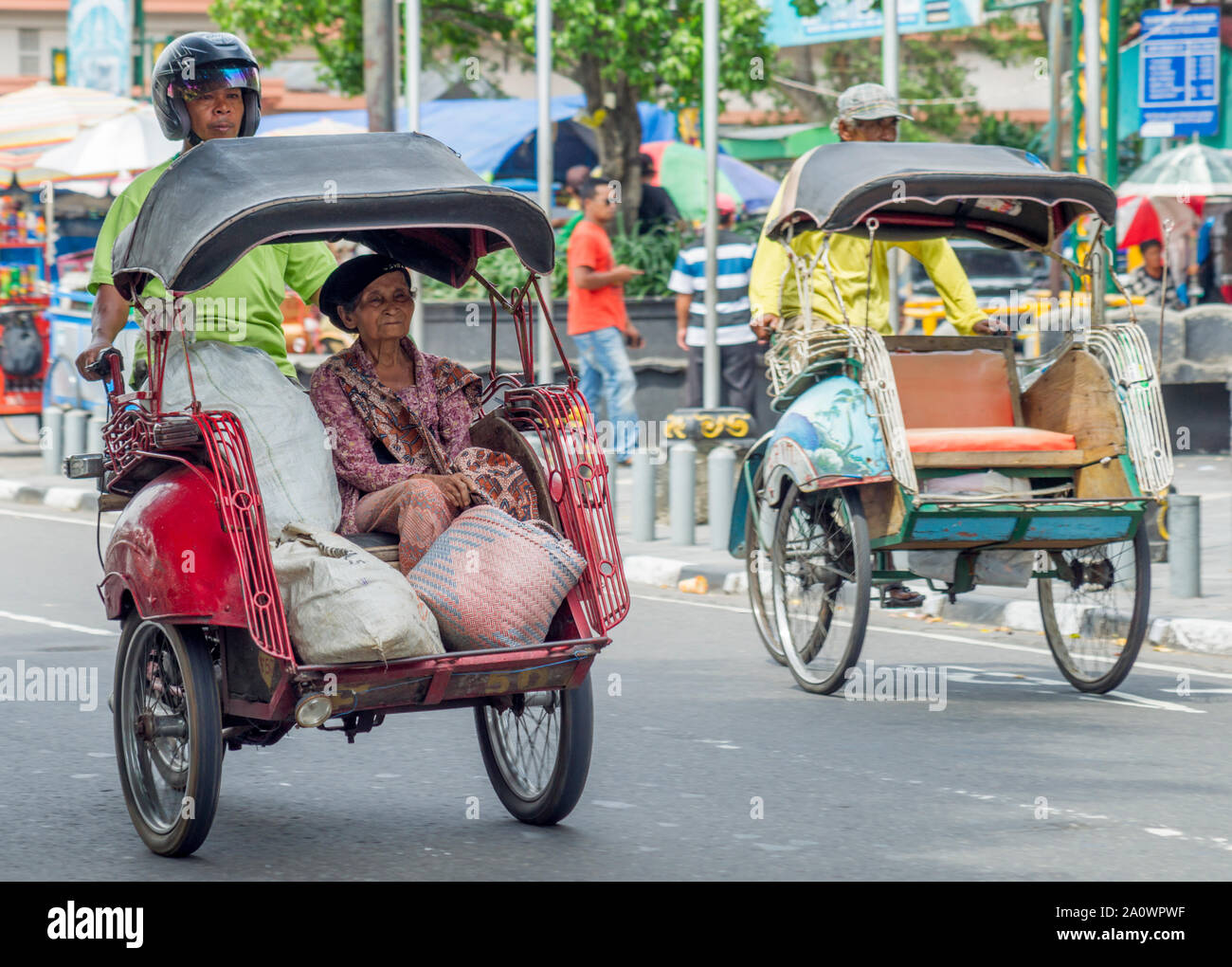 Motorised becak and normal becak, Yogyakarta, Indonesia Stock Photo - Alamy