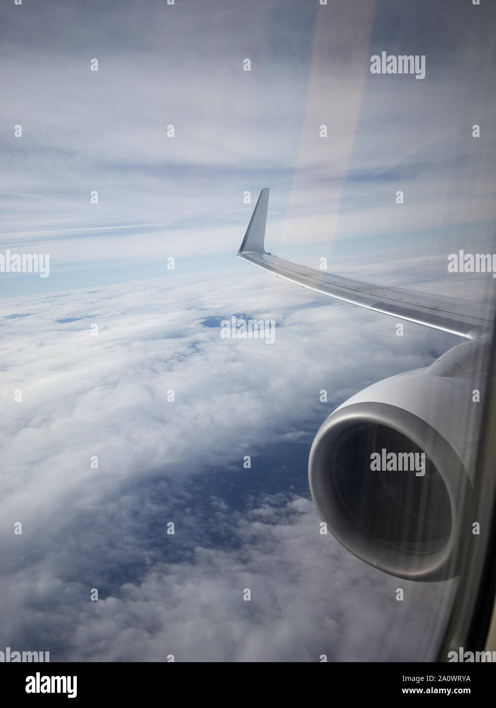 View of the wing from the window of a plane Stock Photo - Alamy