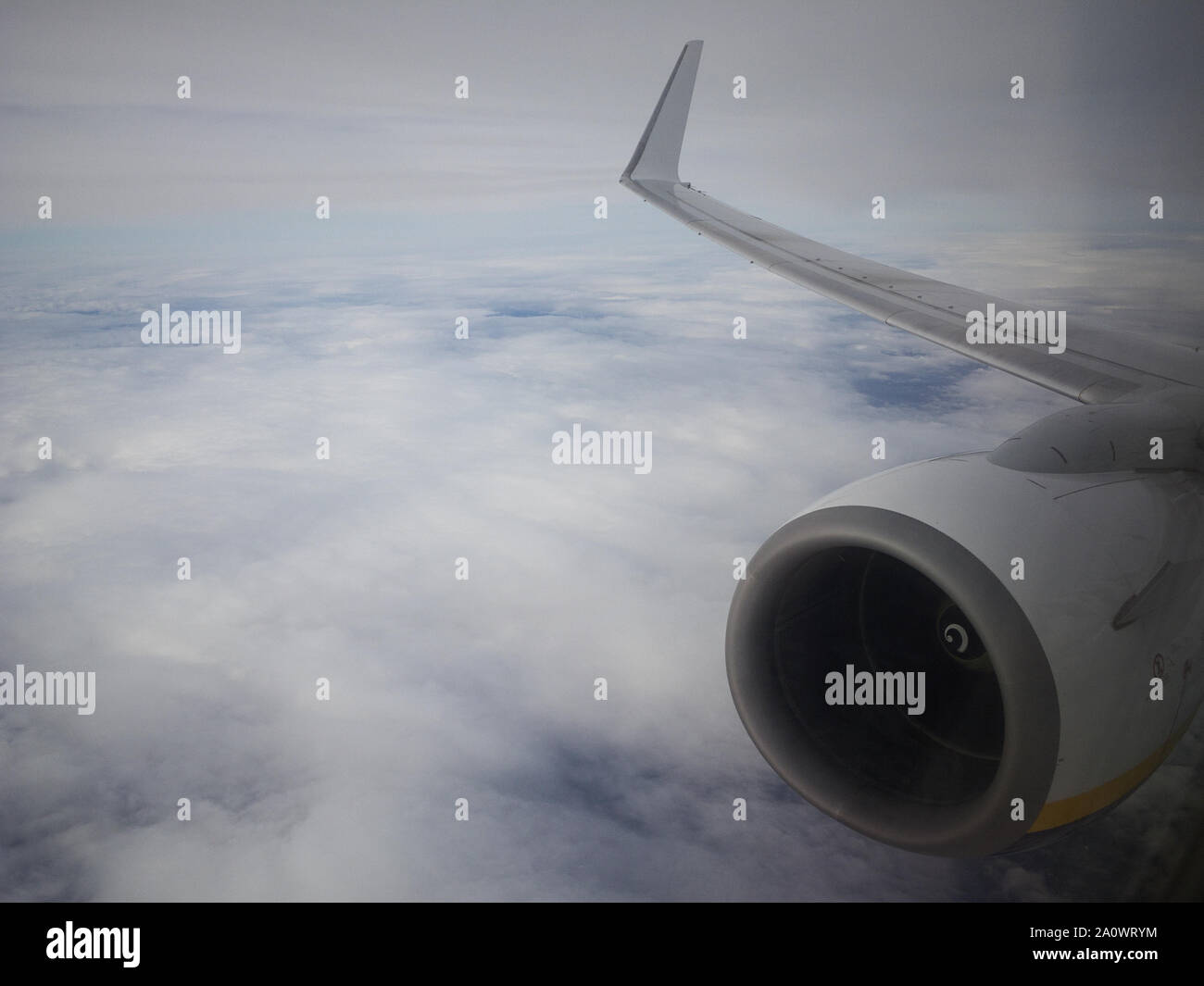 View of the wing from the window of a plane Stock Photo - Alamy