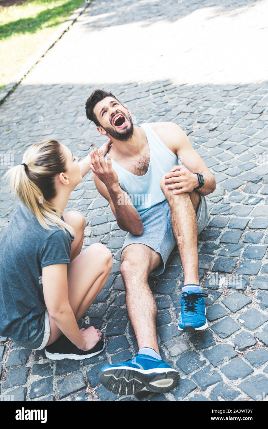 Man touching woman leg hi-res stock photography and images - Alamy