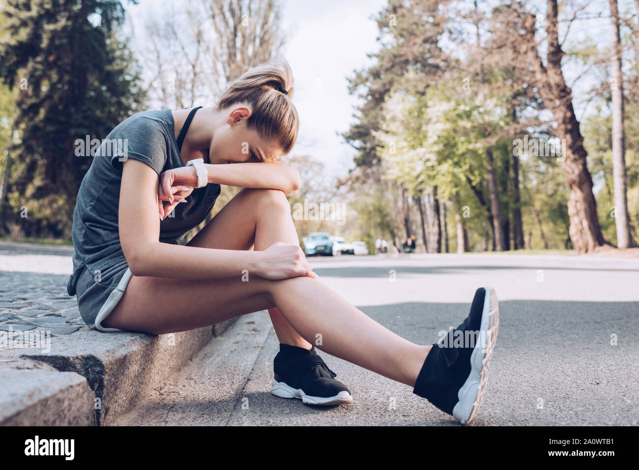 Sad woman crying on street hi-res stock photography and images - Alamy