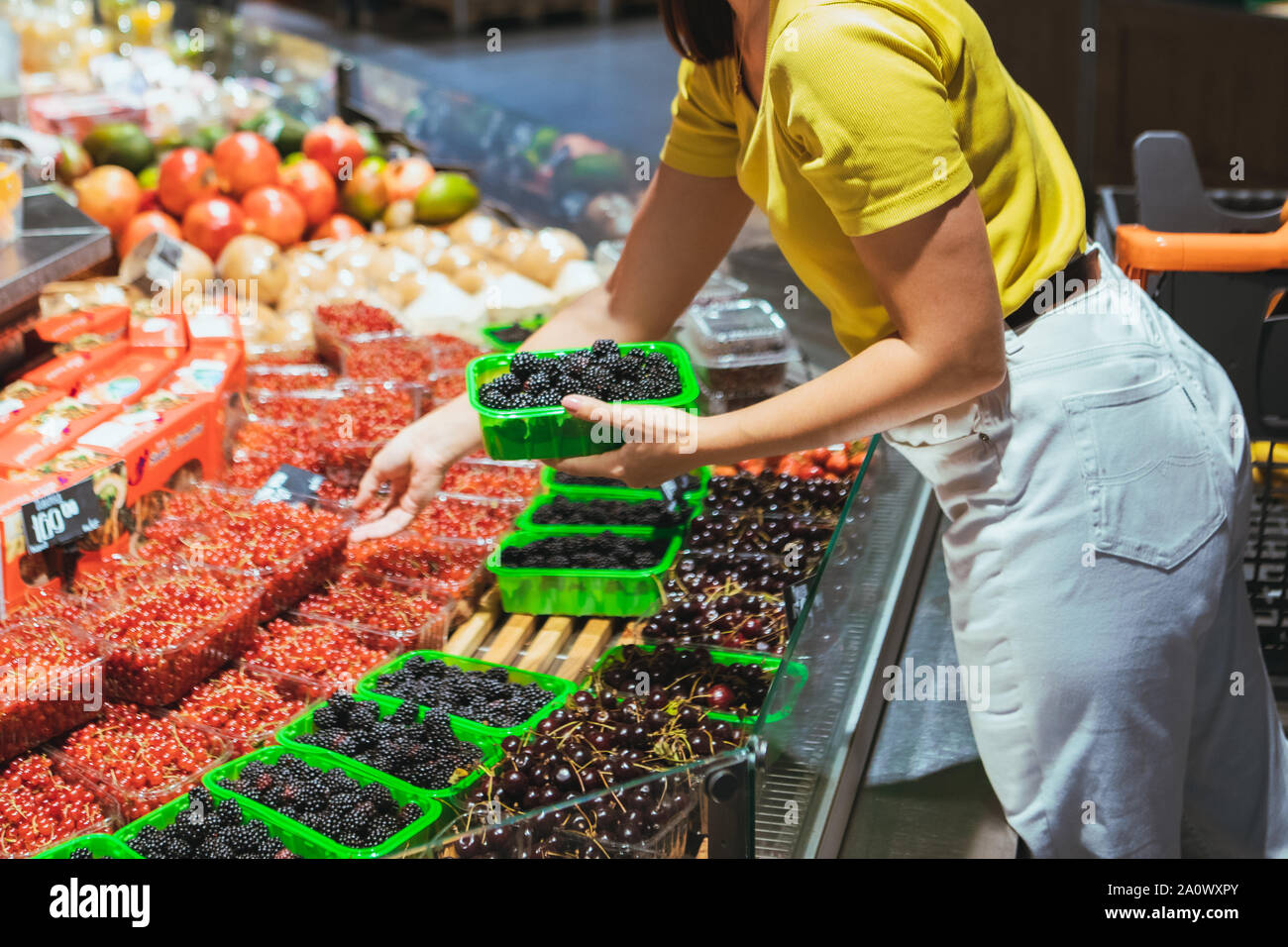 Taking berries hi-res stock photography and images - Alamy