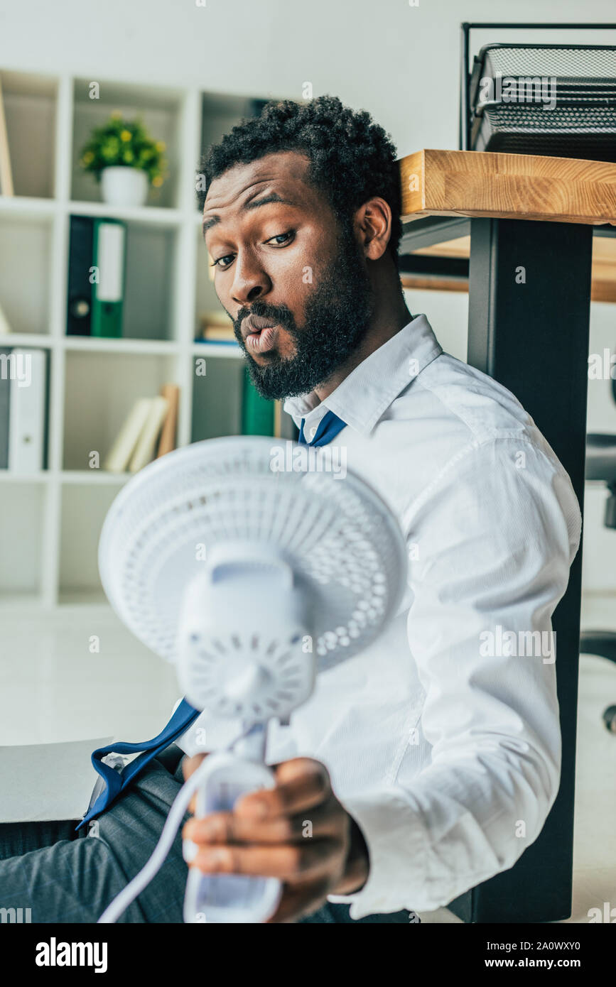Fan on office desk hi-res stock photography and images - Alamy