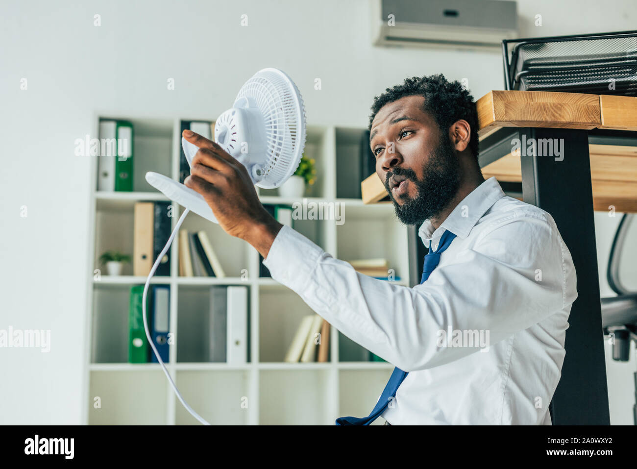 Fan on office desk hi-res stock photography and images - Alamy