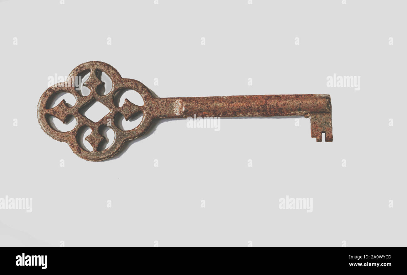 Vintage rusty key on white Stock Photo - Alamy
