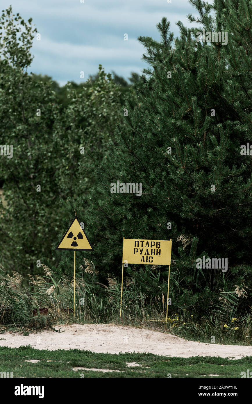 PRIPYAT, UKRAINE - AUGUST 15, 2019: chernobyl zone with yellow warning ...