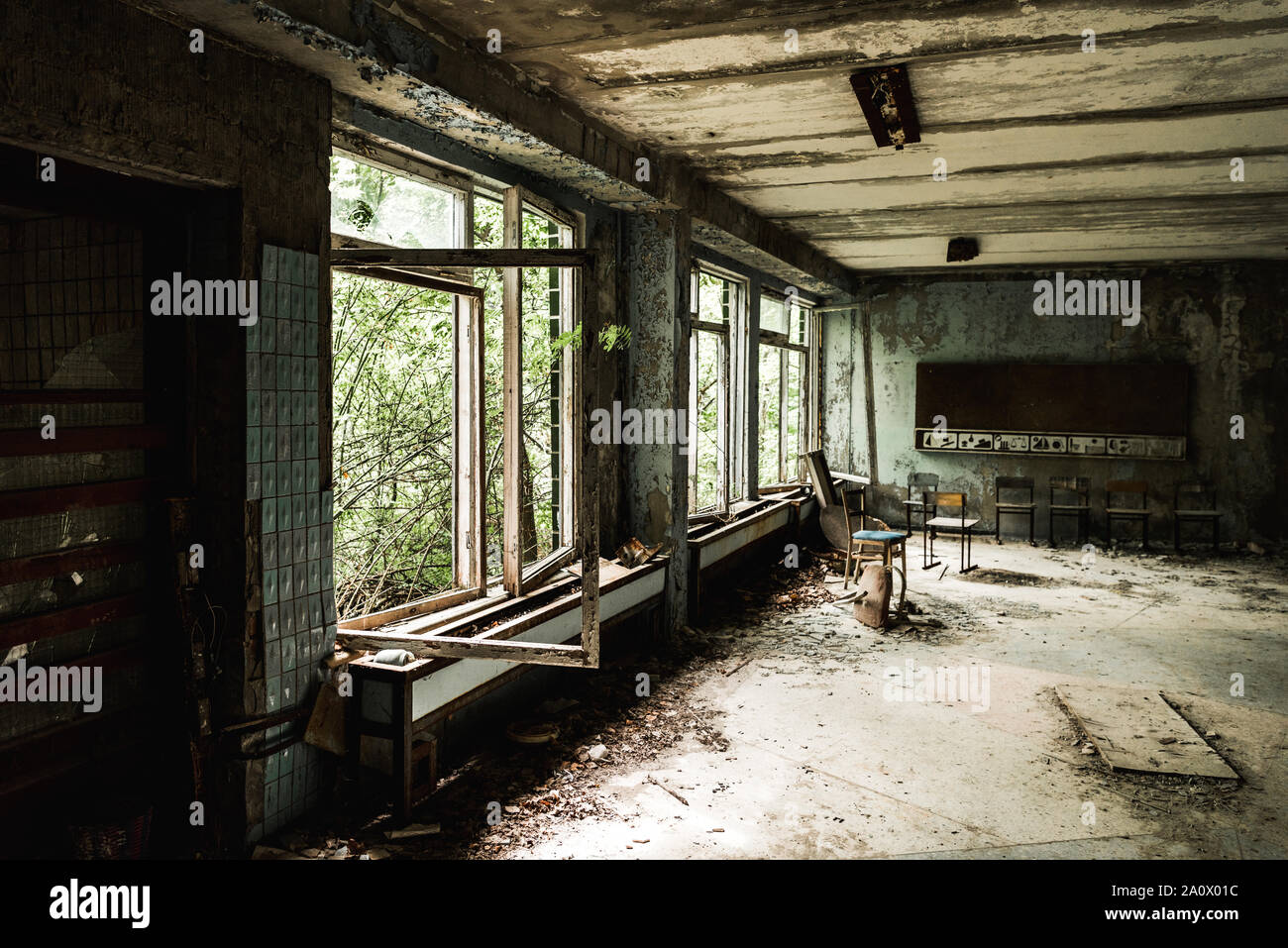 abandoned classroom with dirty chairs in school Stock Photo - Alamy