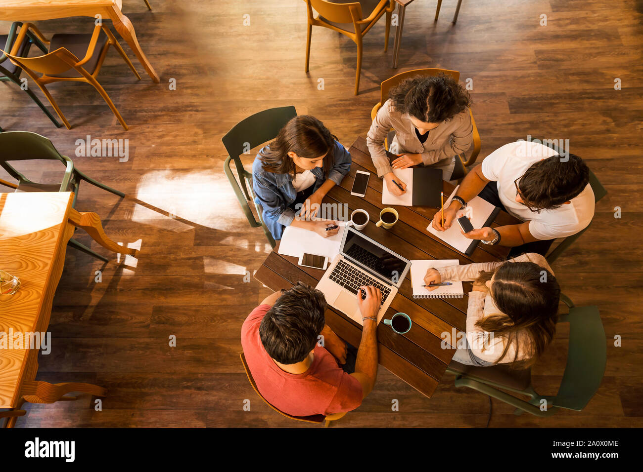 Group of friends studying together for finals Stock Photo - Alamy