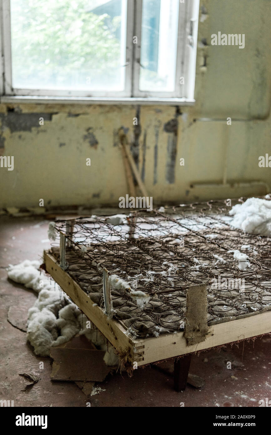 selective focus of rusty bed in damaged bedroom in chernobyl Stock ...