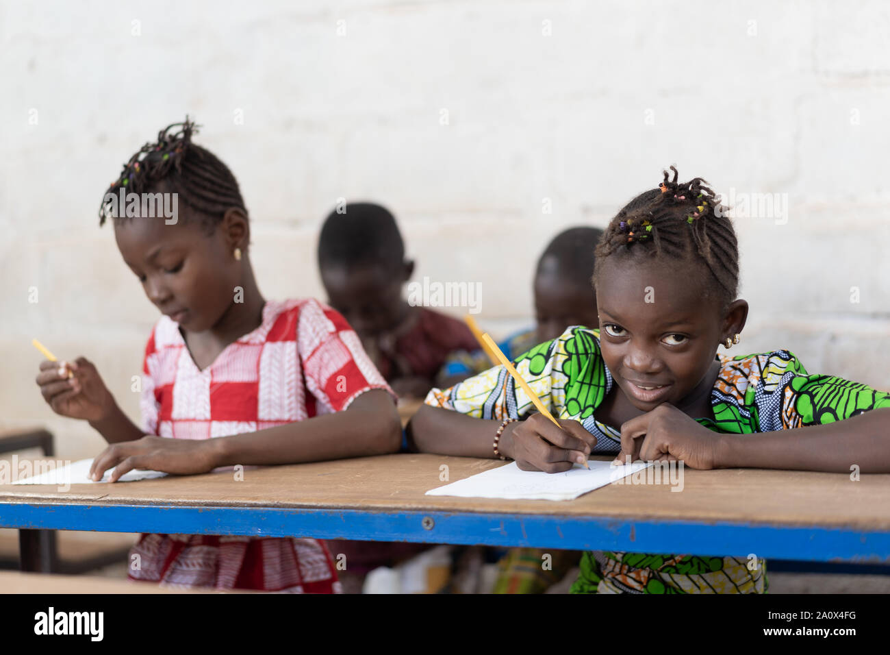 Four Beautiful African Students Studying in Classroom School Stock ...