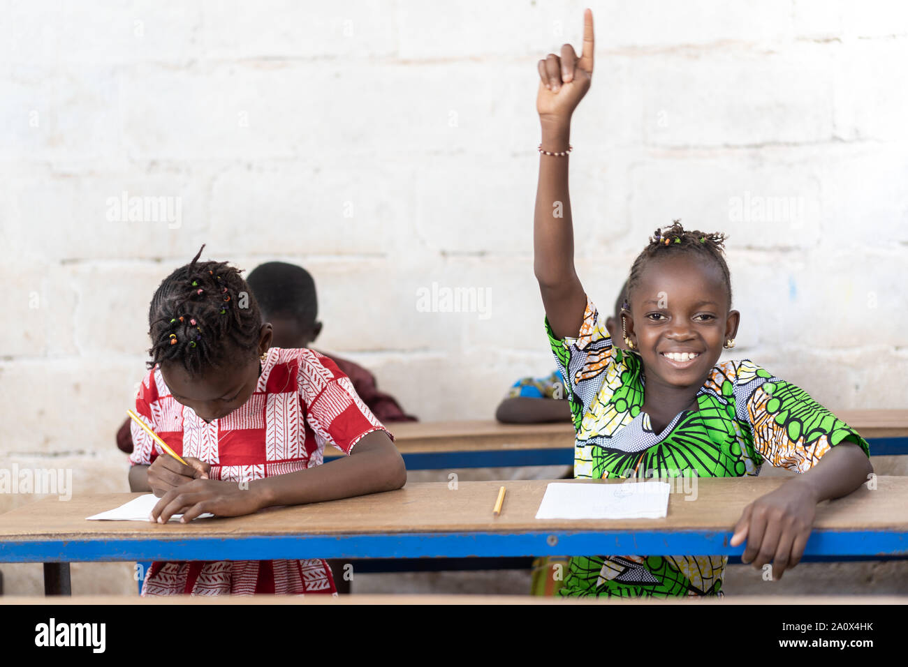 Child raise hand school hi-res stock photography and images - Alamy