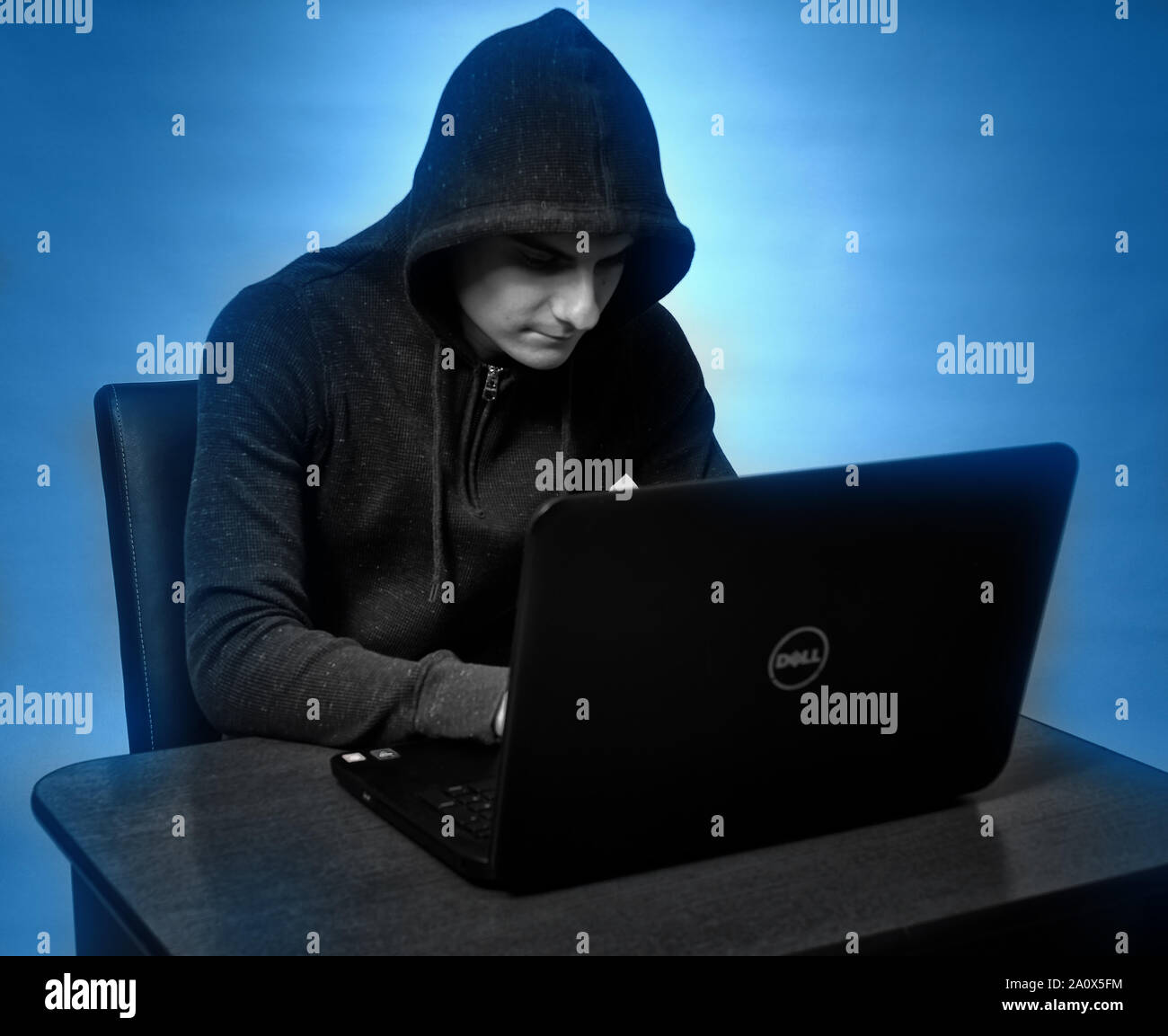 Boy operating laptop hi-res stock photography and images - Alamy