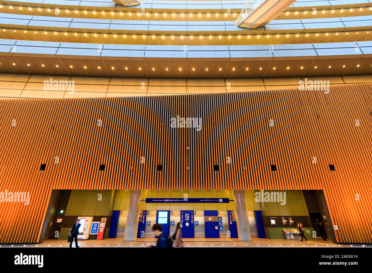 Japan, Tokyo International Forum. Interior, wooden beams going to first ...