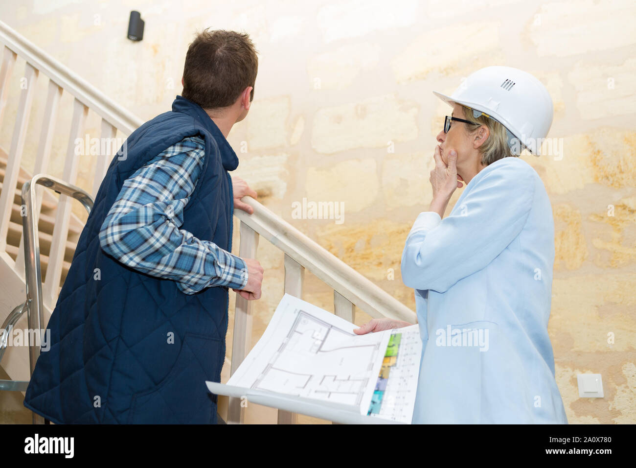 female foreman on the structure stairs Stock Photo - Alamy