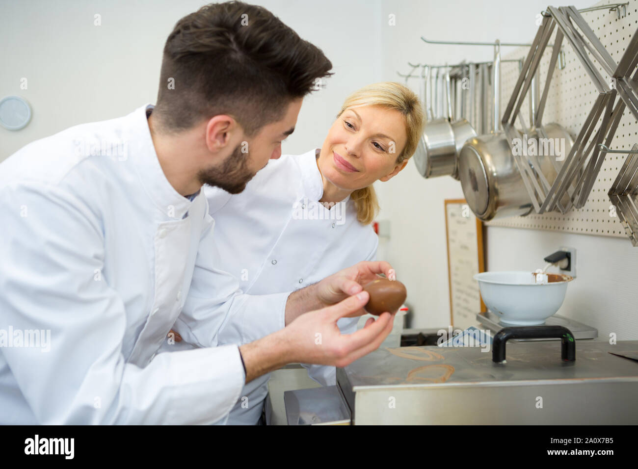 Two milk chocolate eggs hi-res stock photography and images - Alamy